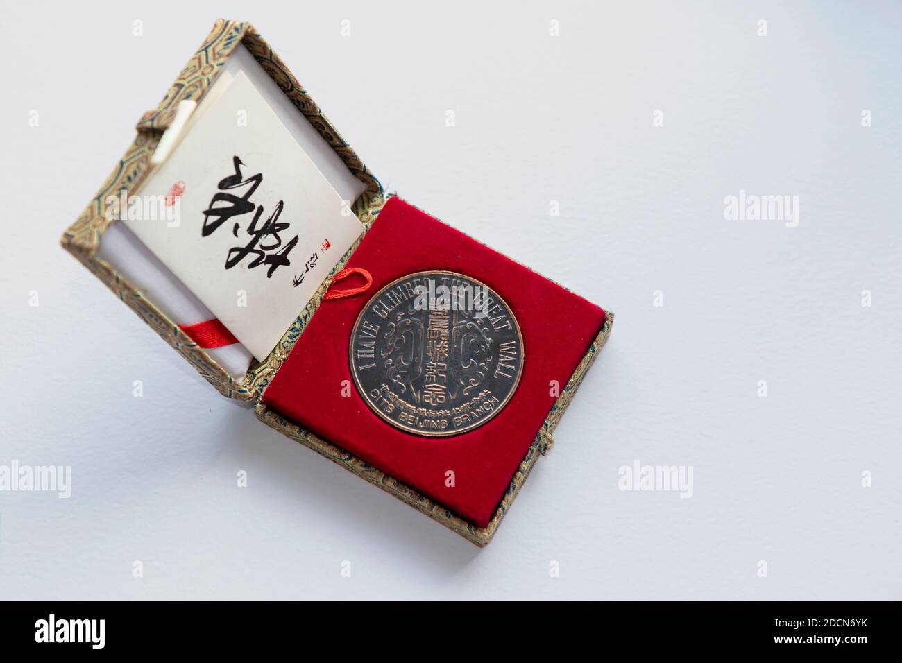 Medal awarded during visit to The Great Wall of China in original silk ...