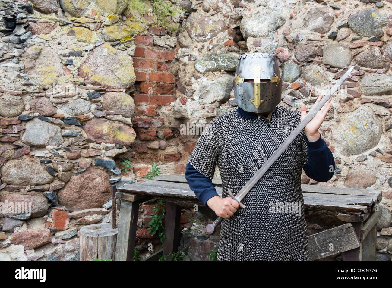 Medieval old knight helmet and chain mail for protection in battle ...