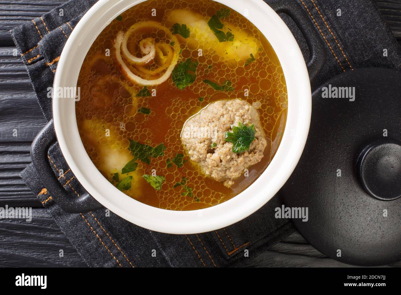 Rindsuppe Traditional Soup From Vienna, Austria close-up in a saucepan ...