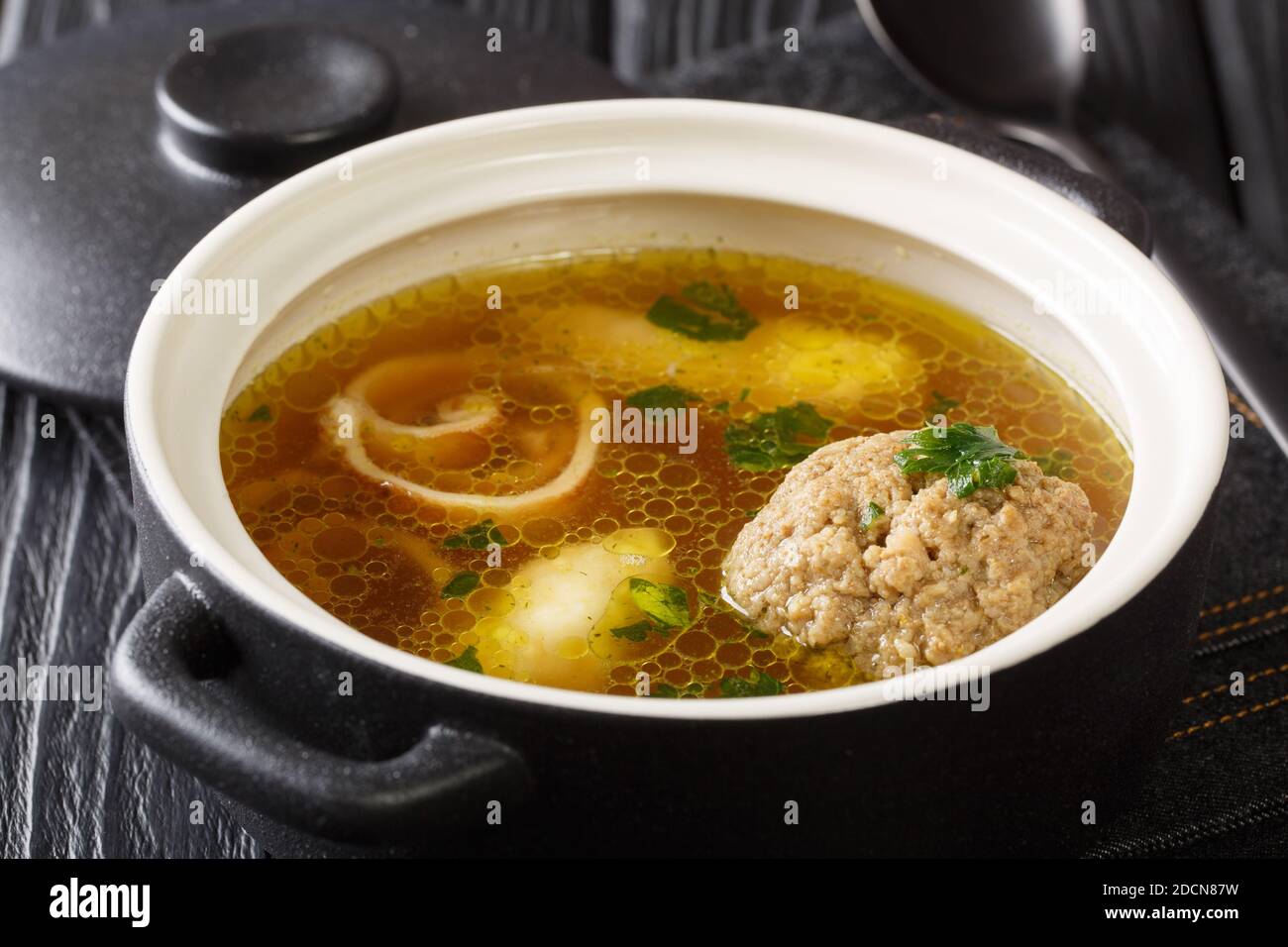 Rindsuppe Traditional Soup From Vienna, Austria close-up in a saucepan ...