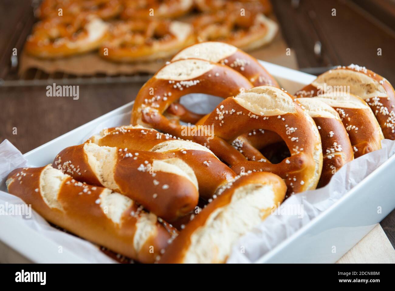 Closeup photo of handmade lye bun and bavarian pretzel in bakery Stock ...