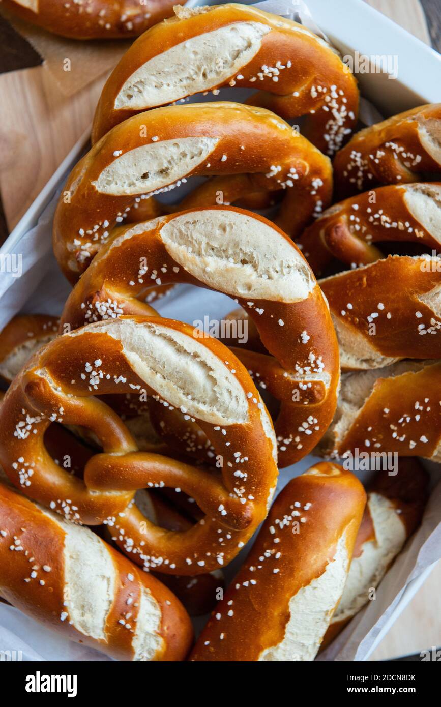 Closeup photo of handmade lye bun and bavarian pretzel in bakery Stock ...