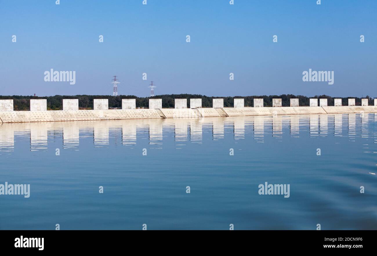 Coastal protective construction made of white concrete blocks mounted ...