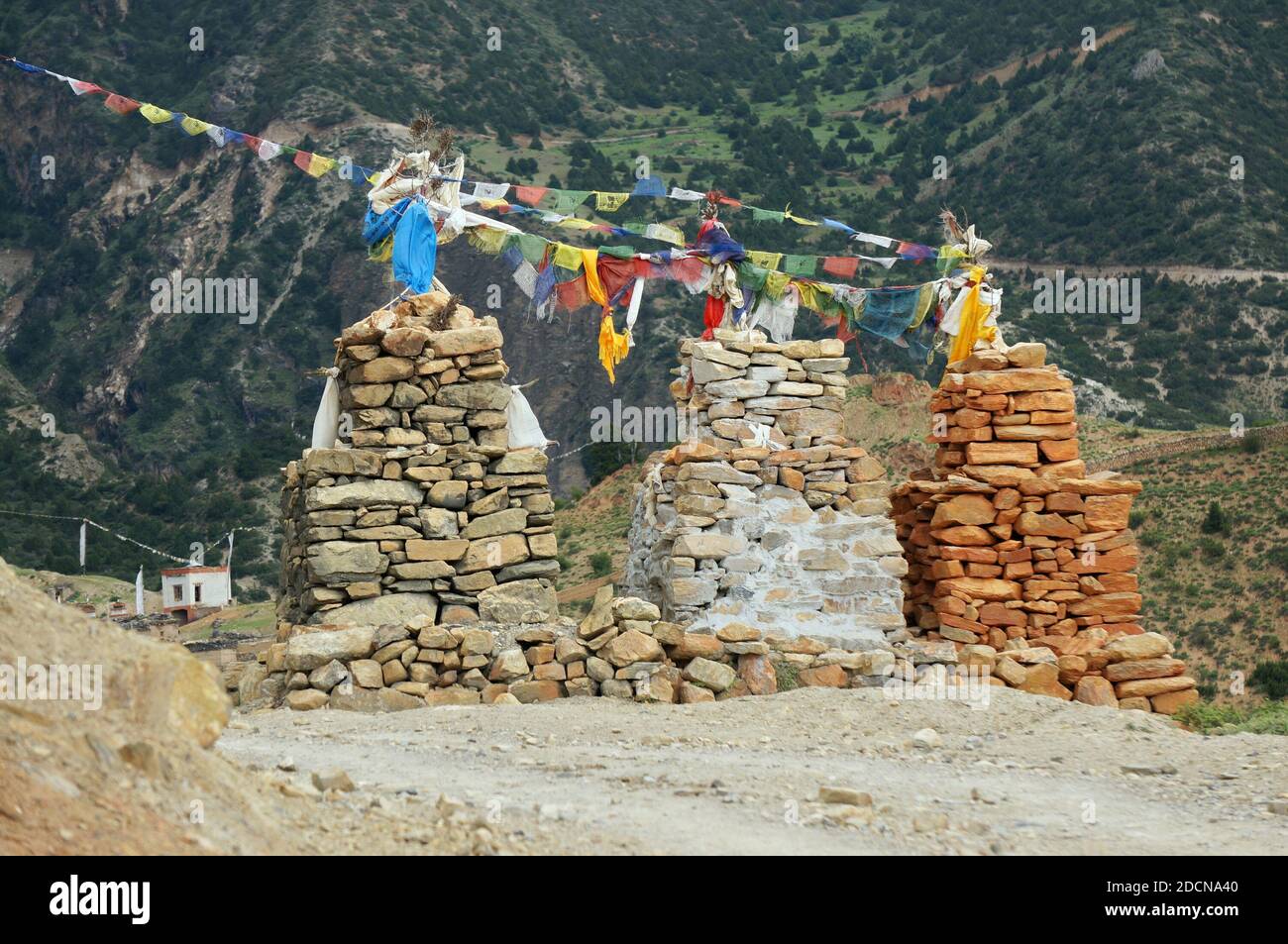 Buddhist chorten with prayer flags hi-res stock photography and images ...