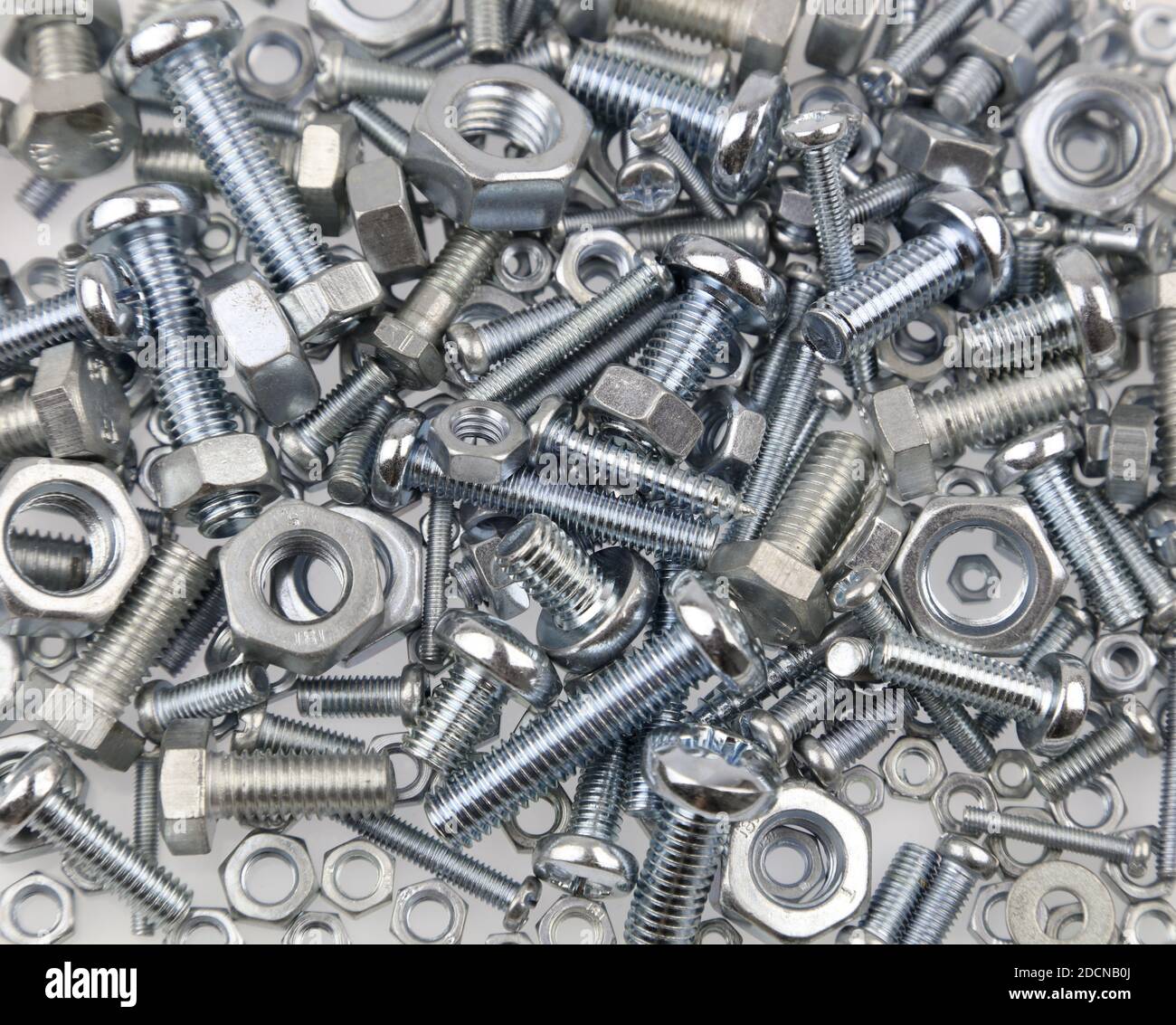Chrome nuts and bolts close-up Stock Photo - Alamy