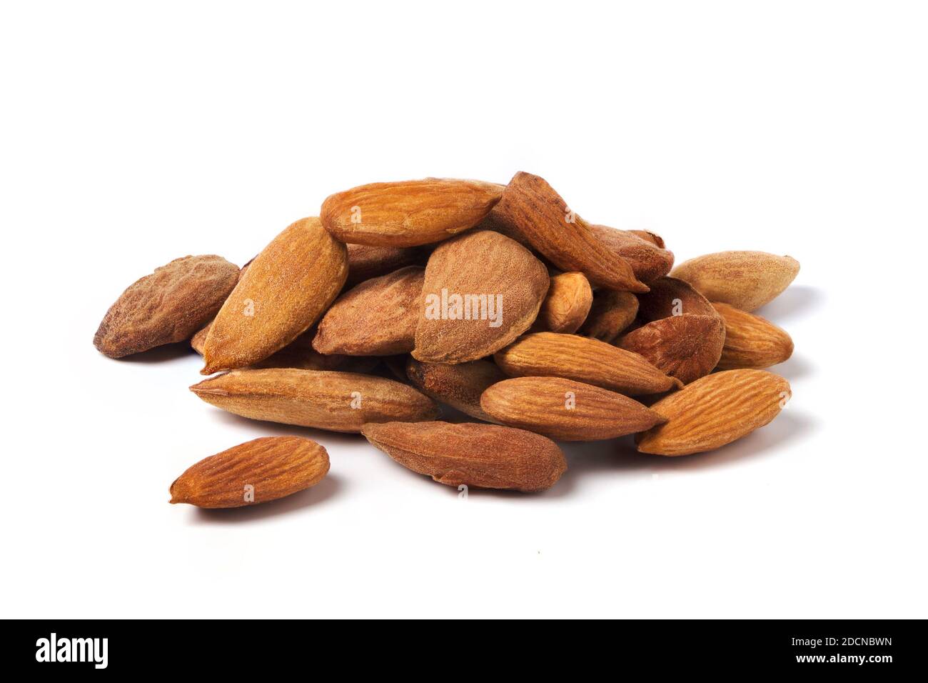 Almond kernels isolated on white. Heap of almond nut kernels Stock ...