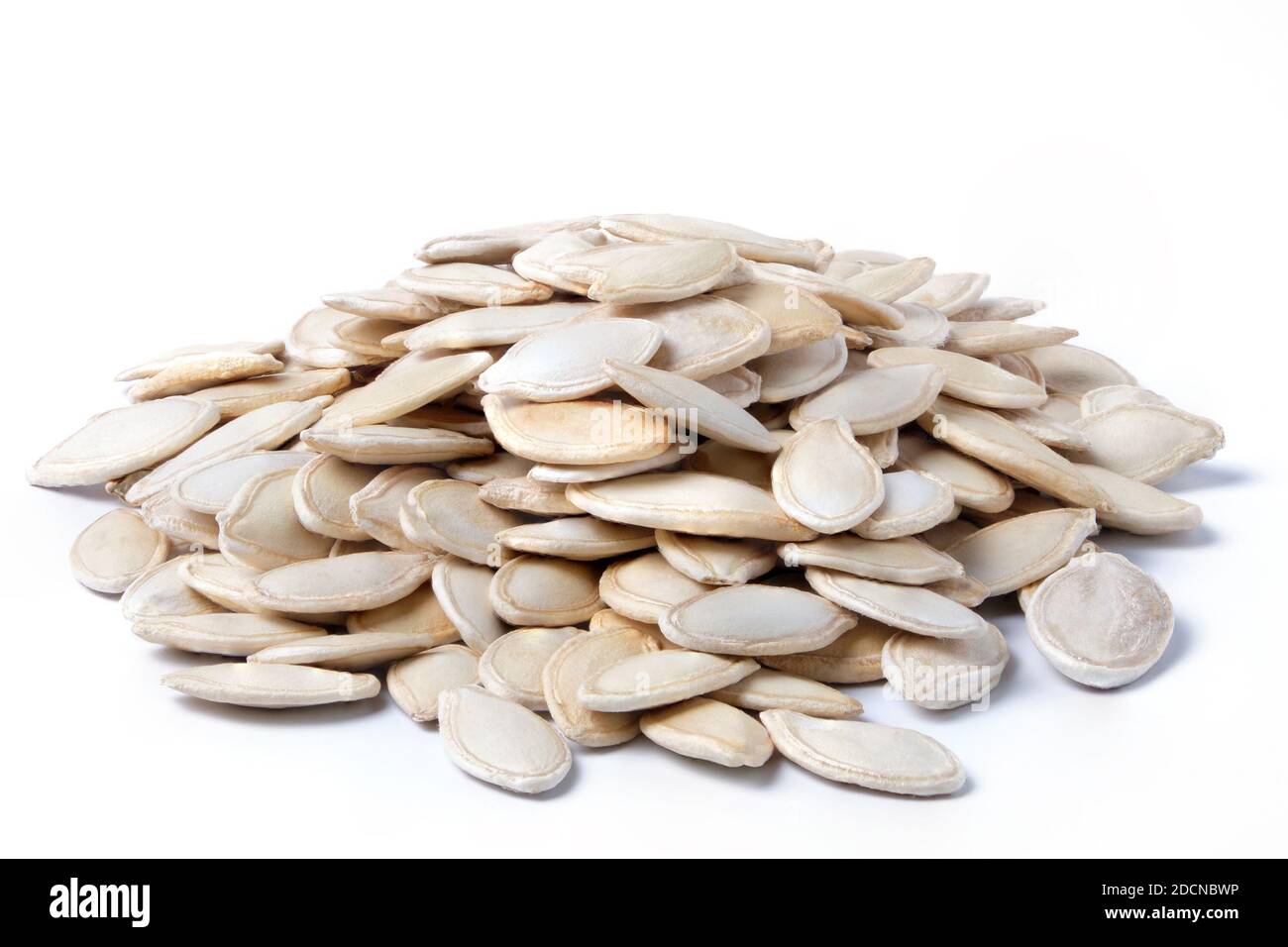 Raw dried pumpkin seeds isolated on white. Heap of pumpkin seeds Stock ...