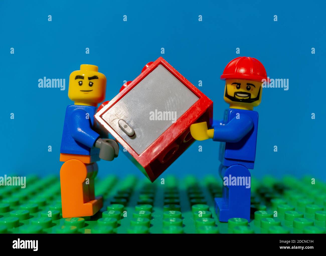 POZNAN, POLAND - Nov 20, 2020: Lego construction worker team with blue ...