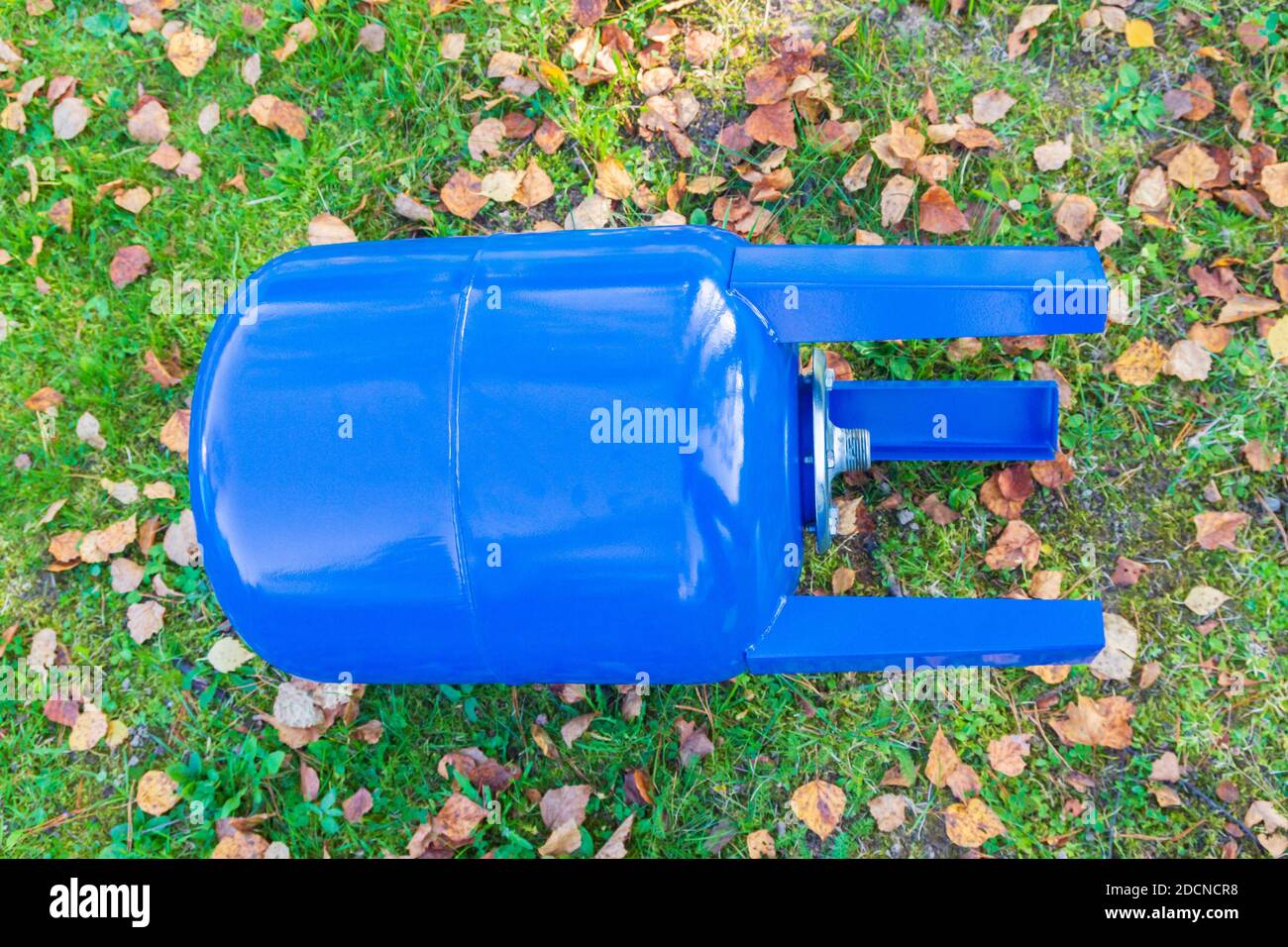 Blue metal water tank for 50 liters of water Stock Photo - Alamy