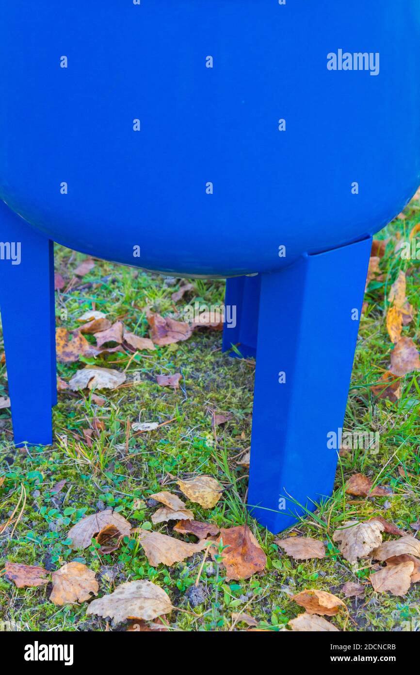 Blue metal water tank for 50 liters of water Stock Photo - Alamy