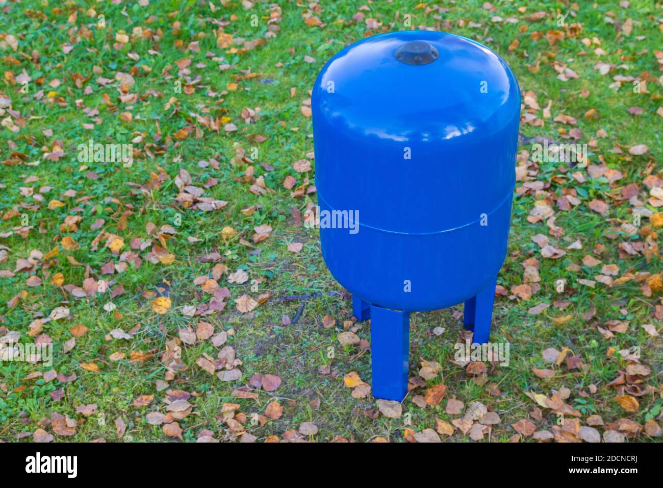 Blue metal water tank for 50 liters of water Stock Photo - Alamy