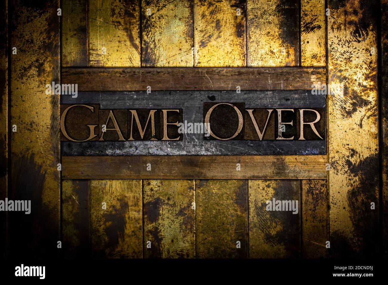 Game Over text message on textured grunge copper and vintage gold ...