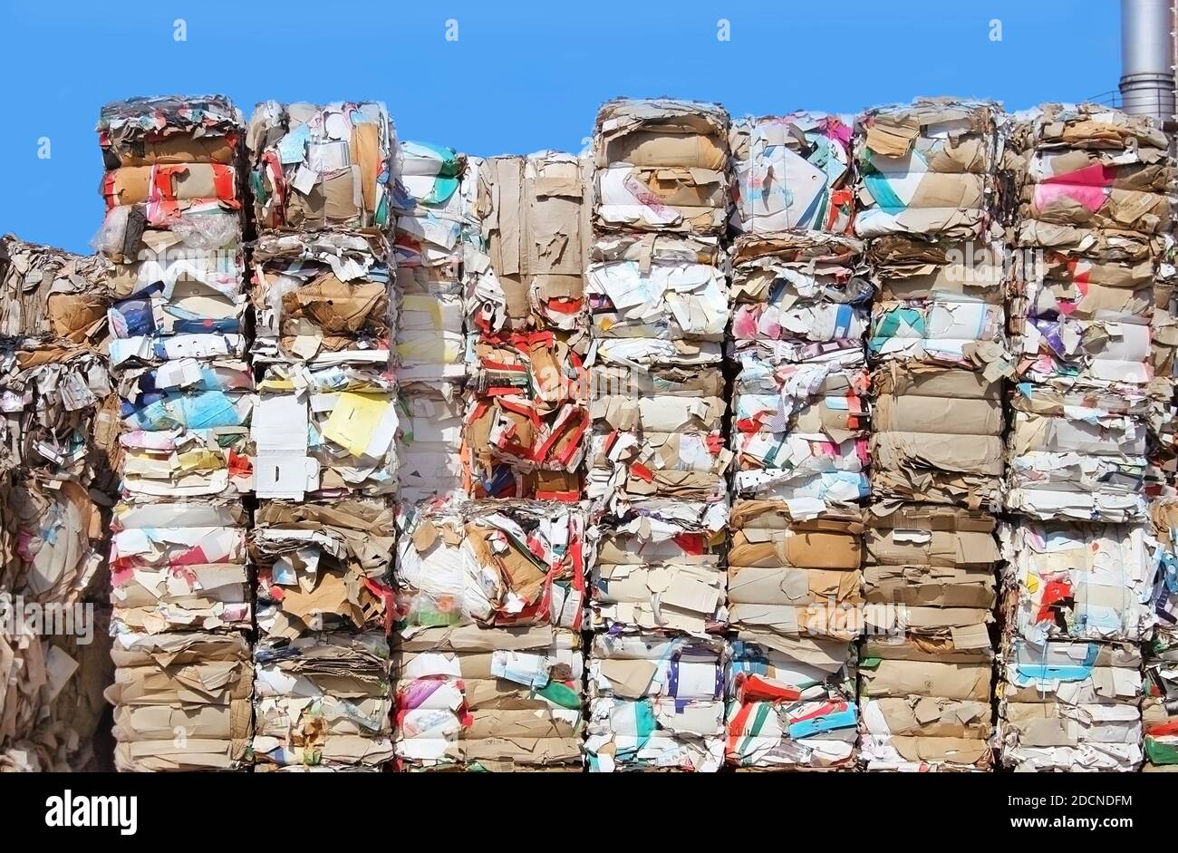 Endless stock paper and cardboard recycling Stock Photo - Alamy