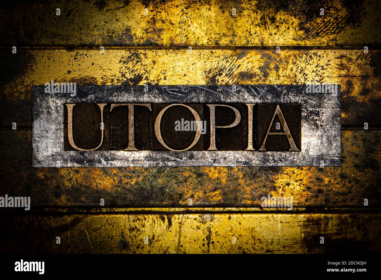 Utopia text on textured lead with grunge copper and vintage gold ...