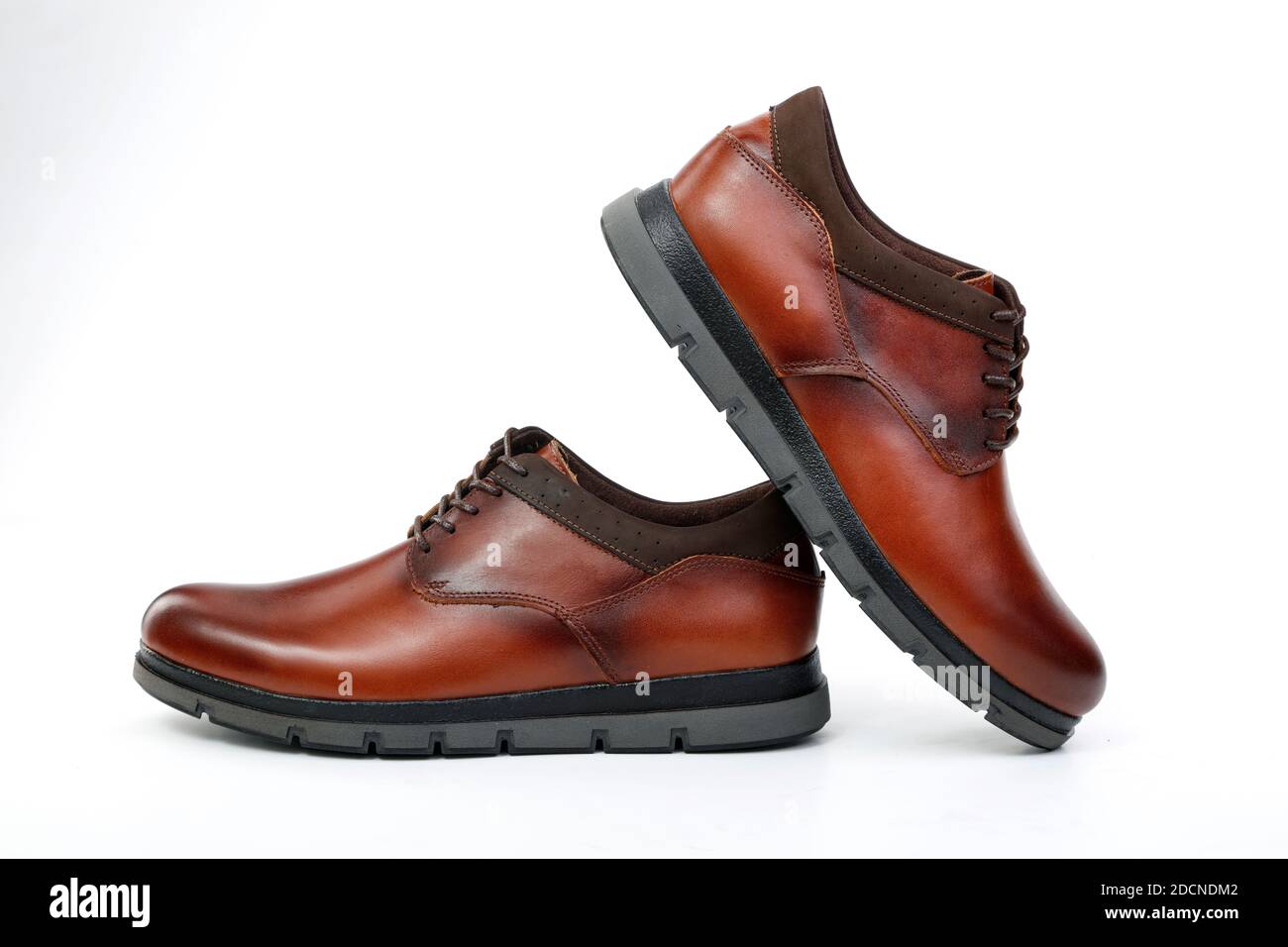 A pair of classic men's shoes on a white background Stock Photo - Alamy