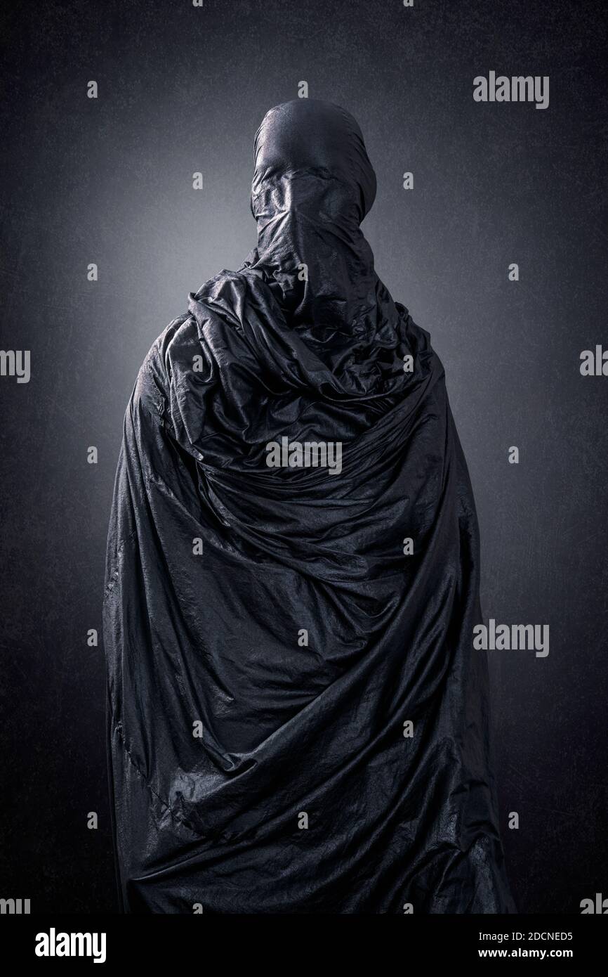 Ghostly figure in the dark Stock Photo - Alamy