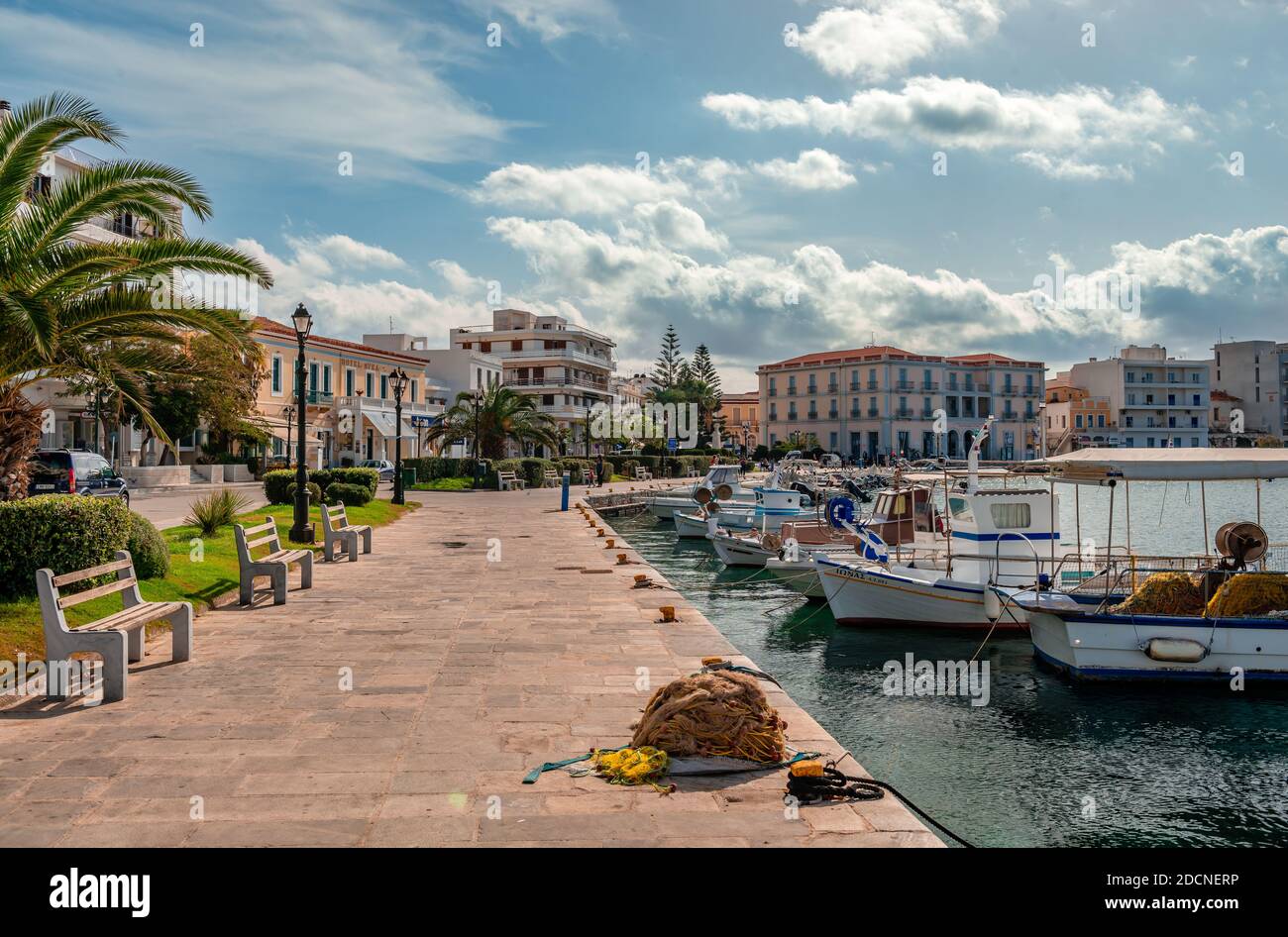 View of the waterfront of Chora, capital of the island of Tinos, on a ...