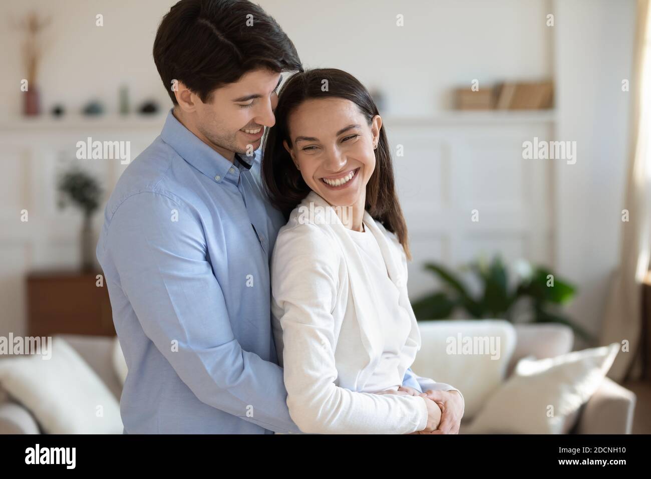 Husband holding wife in arms hi-res stock photography and images - Alamy