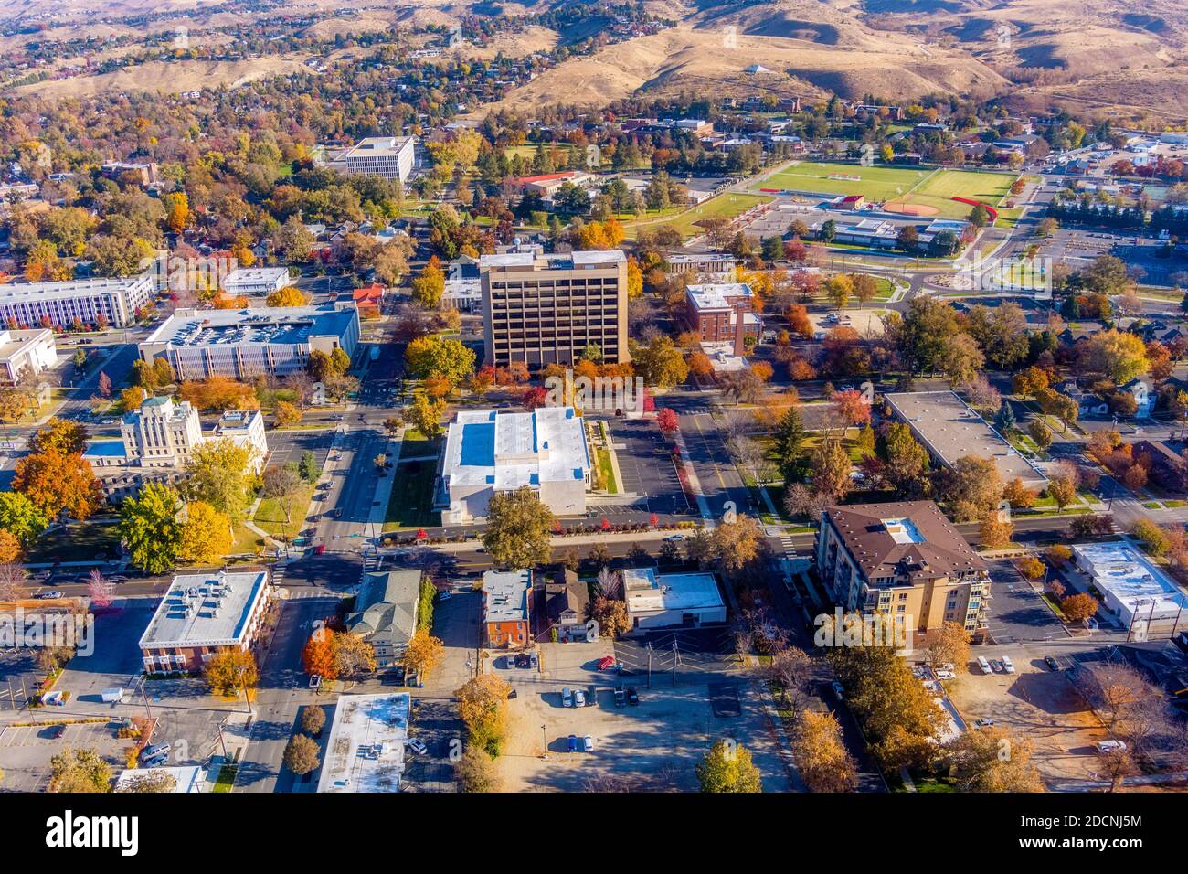 Buildings and streets of a small town and autumn trees Stock Photo - Alamy