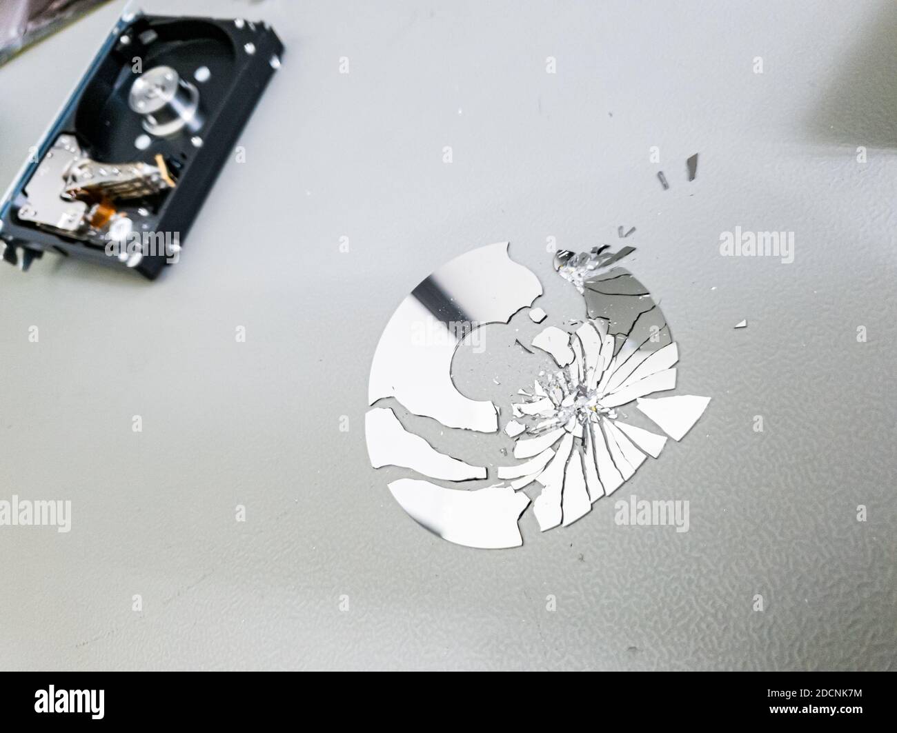 Shattered platter of computer hard drive disk Stock Photo - Alamy