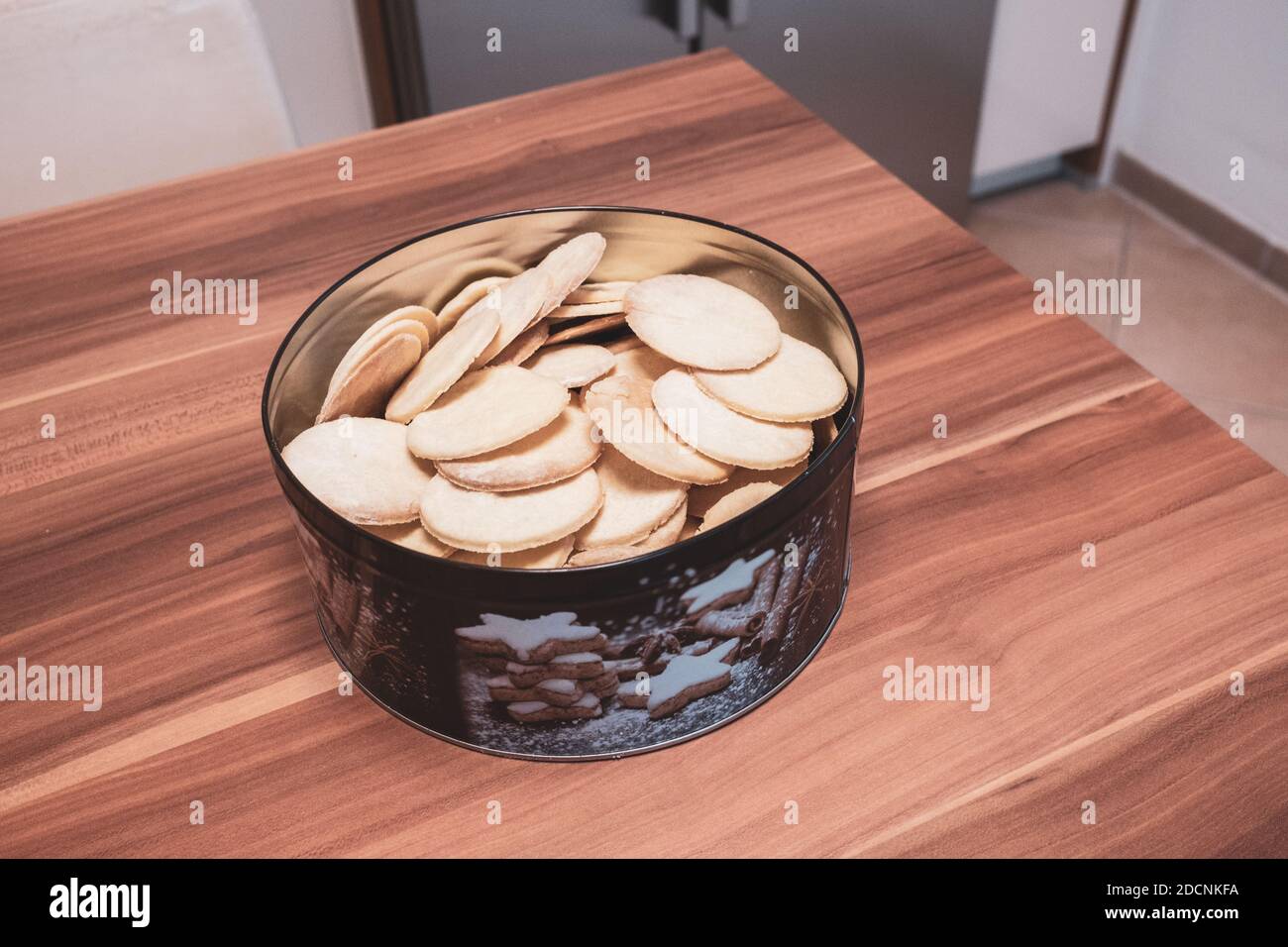 in a round cookie tin are the ready-baked Christmas cookies Stock Photo ...