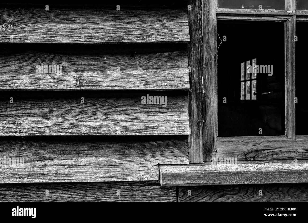 Timber cladded building in state of decay Stock Photo - Alamy