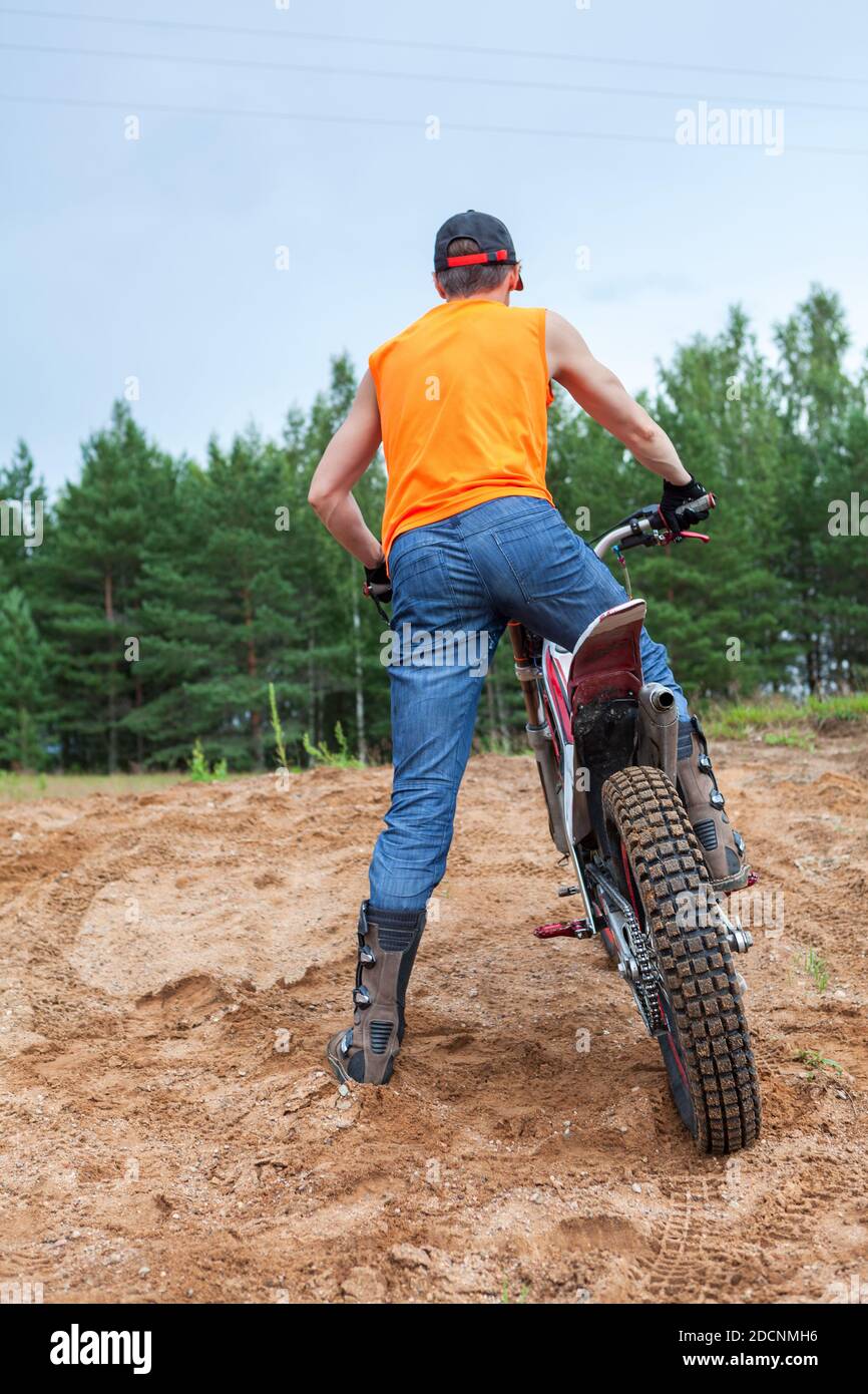 Rear view man riding motorcycle hi-res stock photography and images - Alamy