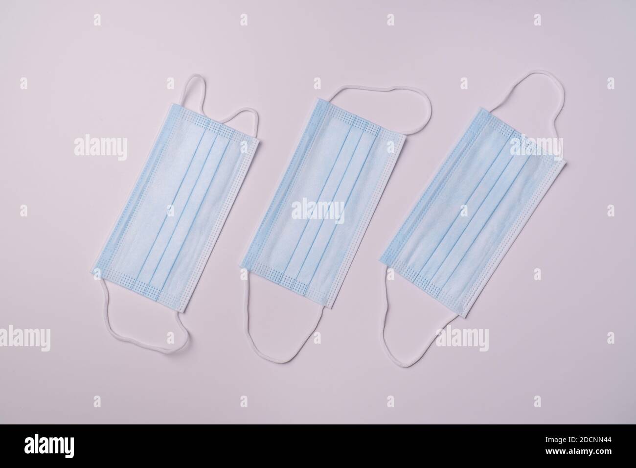 A top view of medical masks on white background - the concept of new ...