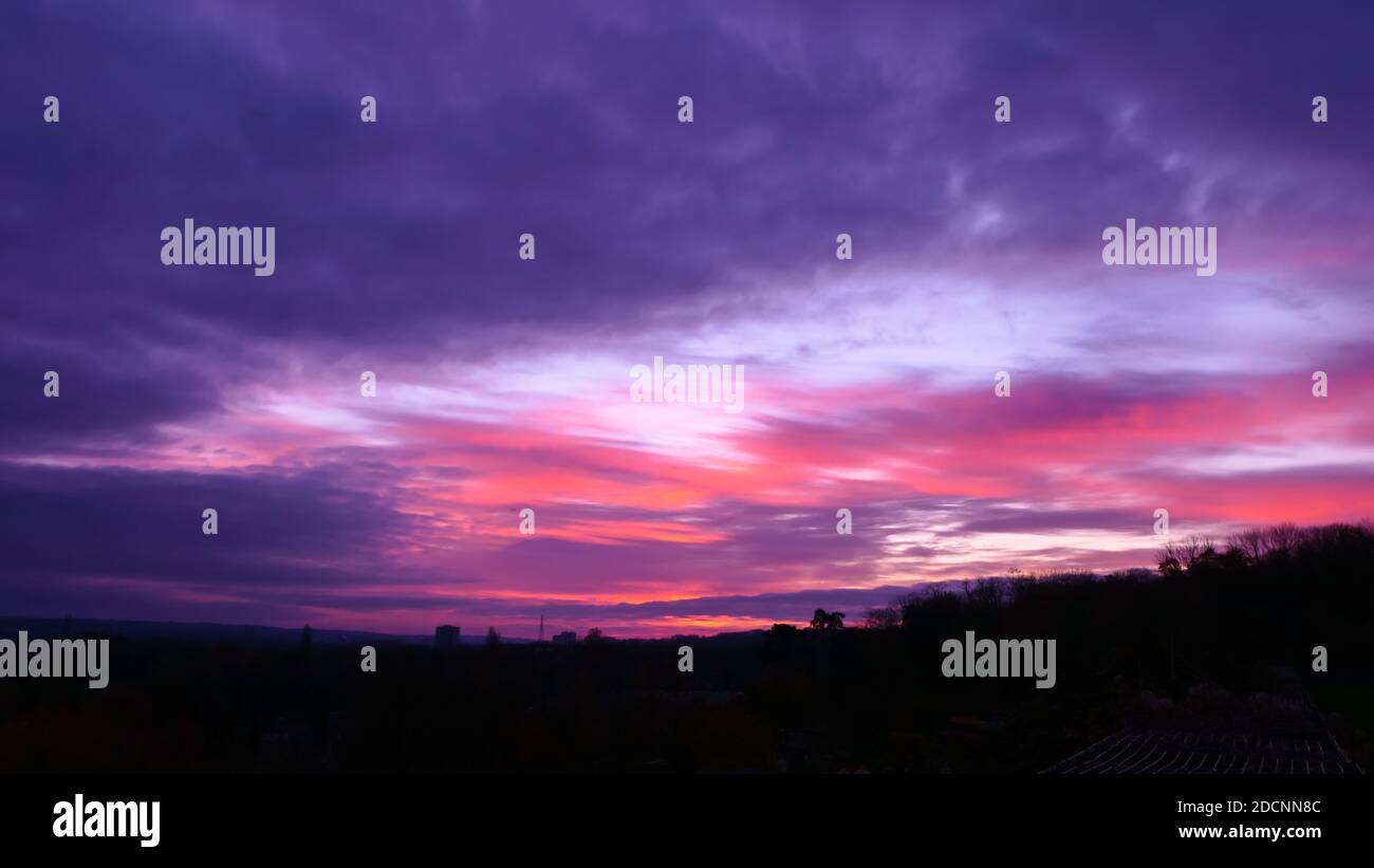 Amazing sunrise in rural scene. Dramatic sky with sunbeam and stratus ...