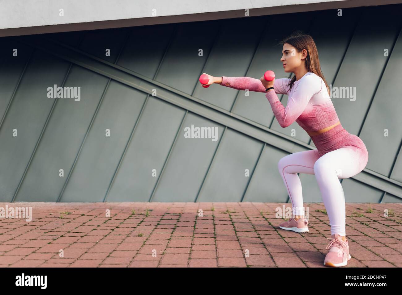 Girl Doing Squats High Resolution Stock Photography and Images - Alamy