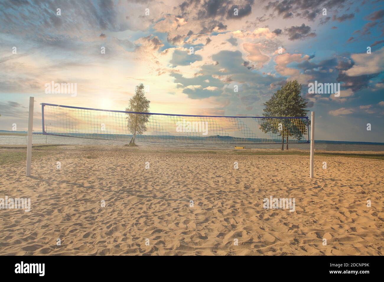 A beach volleyball net on a beautiful sunny day. Complete with sand ...