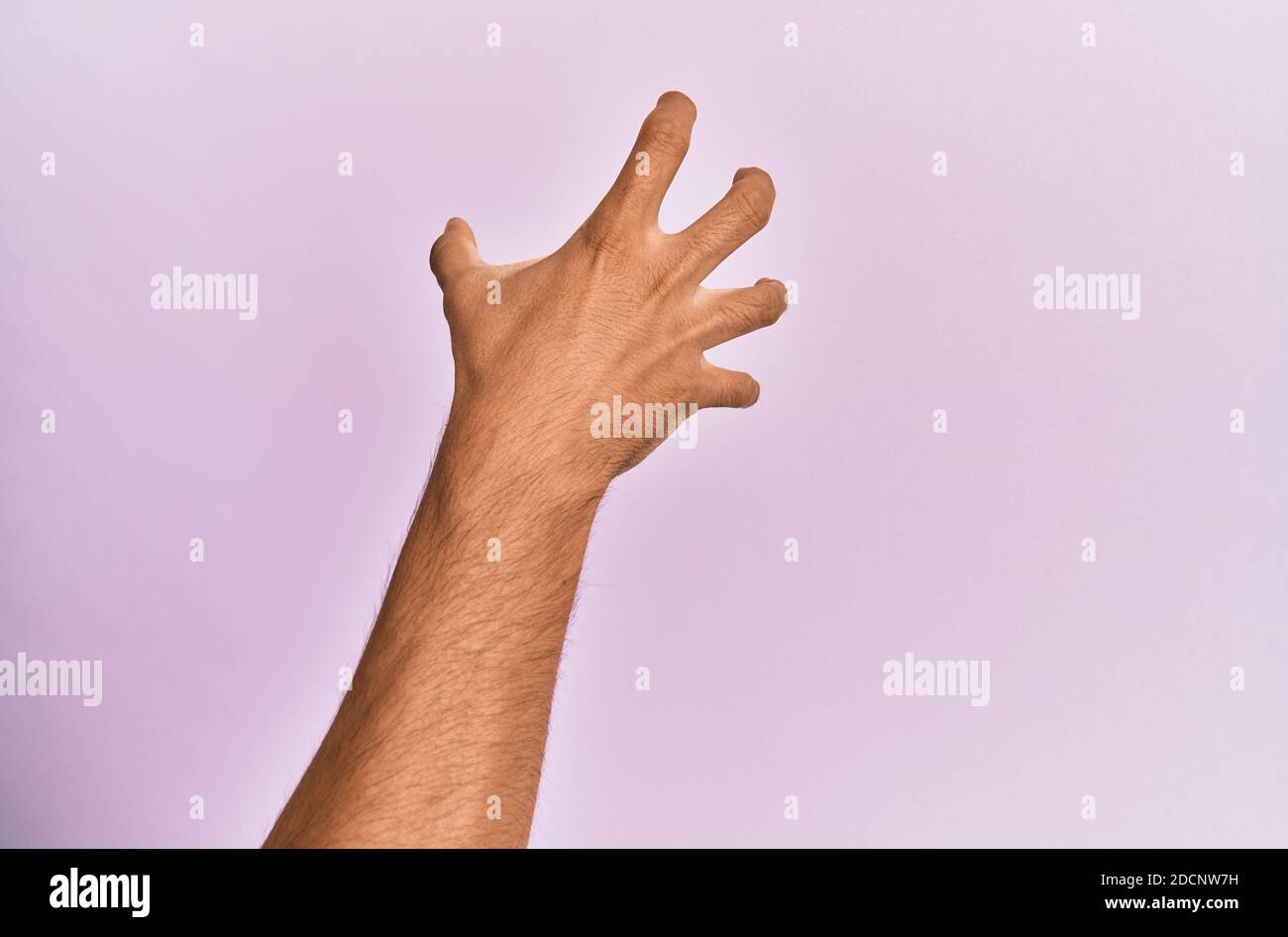 Grasping arm hi-res stock photography and images - Alamy