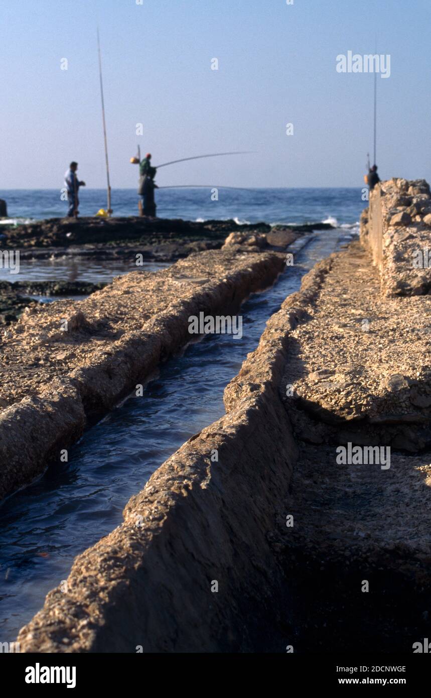 Beirut Lebanon St George's - Open Sewer And Fishermen Stock Photo - Alamy