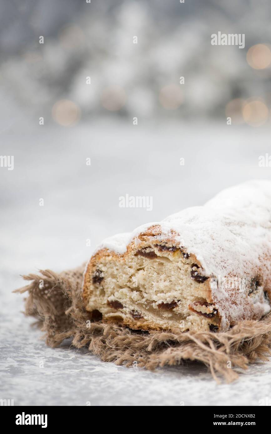 Christstollen, traditonal christmas cake with nuts, raisons, marzipan ...