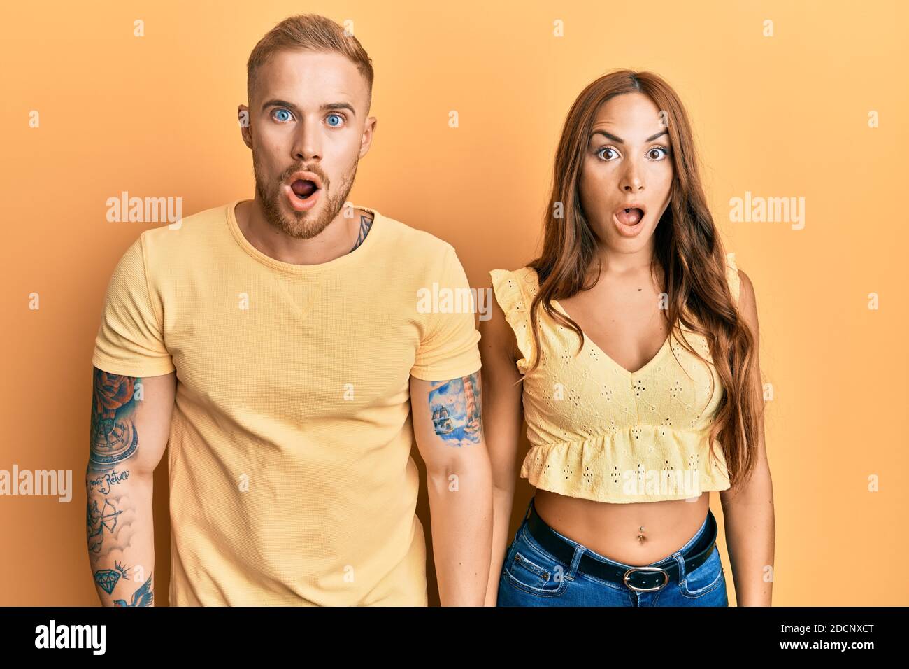 Young couple of girlfriend and boyfriend hugging and standing together ...