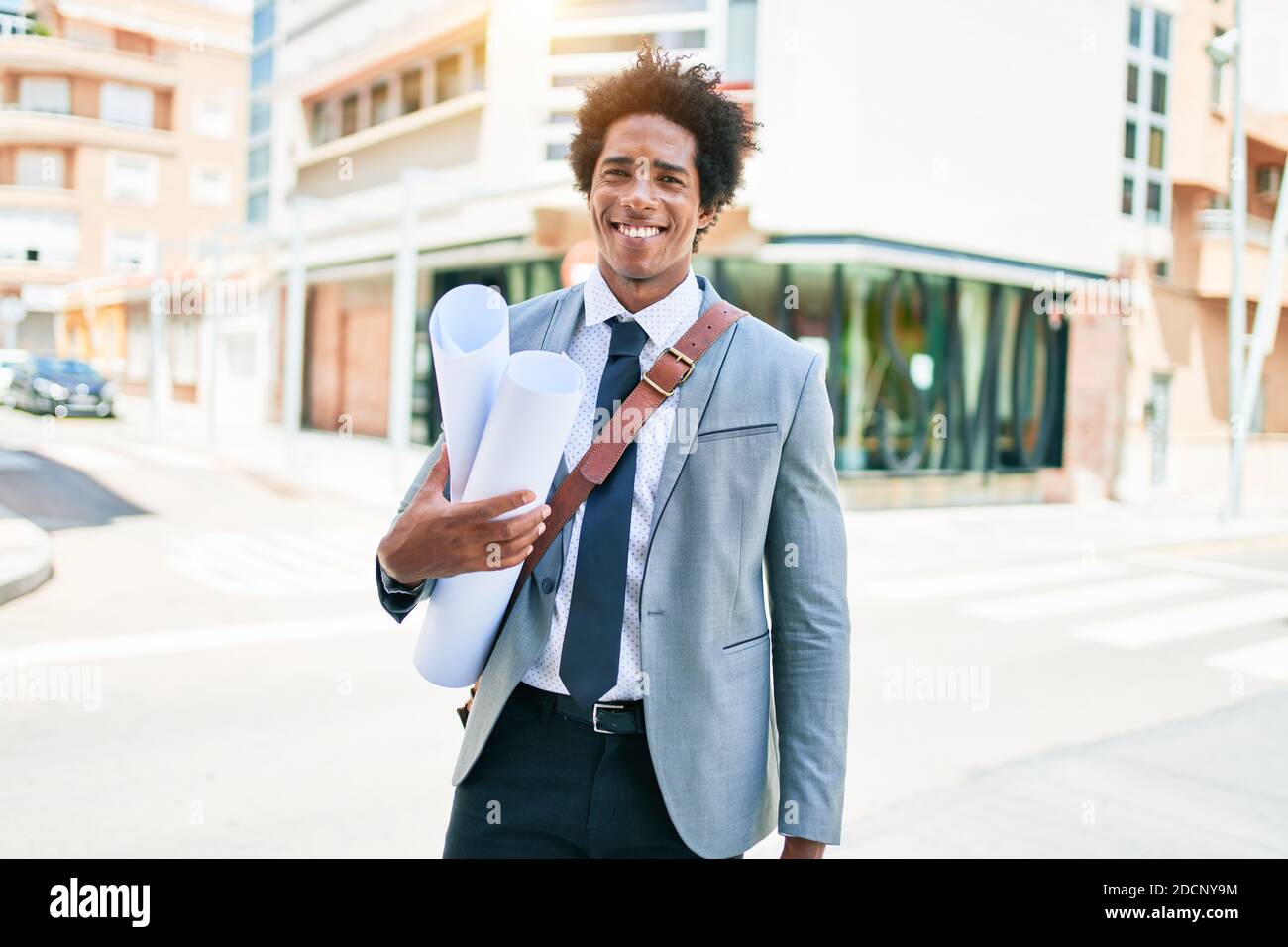 Young handsome african american architect man smiling happy. Standing ...
