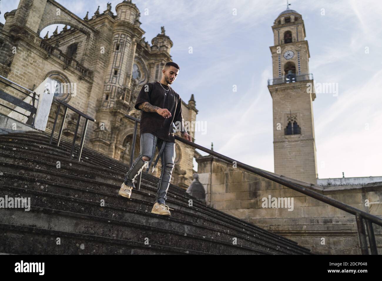 Man coming down stairs hi-res stock photography and images - Alamy