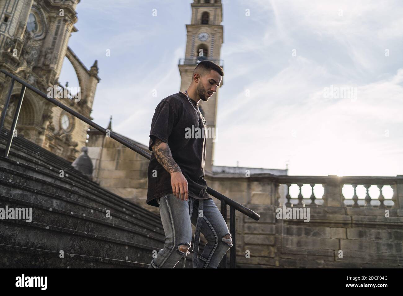 Person coming down stairs hi-res stock photography and images - Alamy