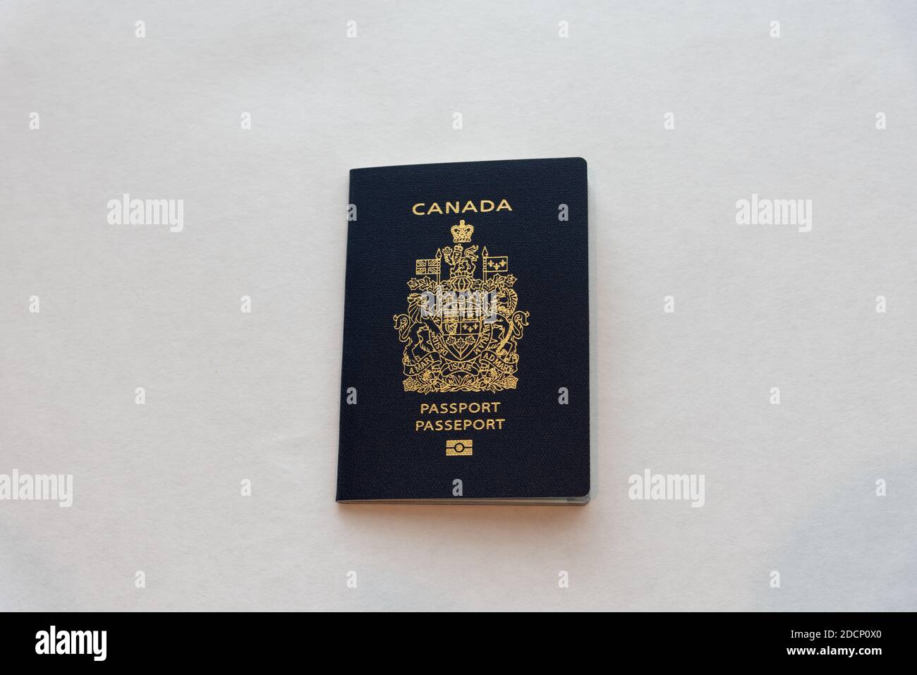 Canadian passports isolated on white background Stock Photo - Alamy