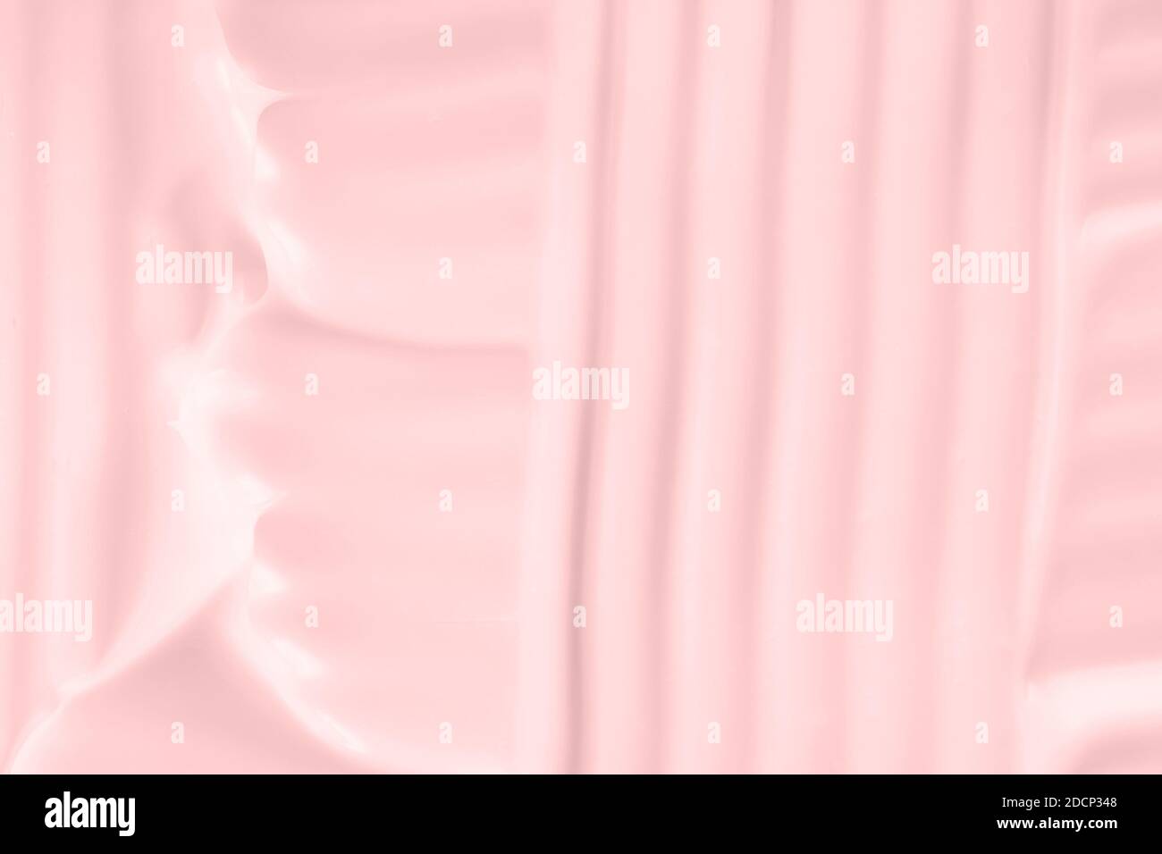 Pink skincare beauty cream product swipe closeup. Body lotion texture ...