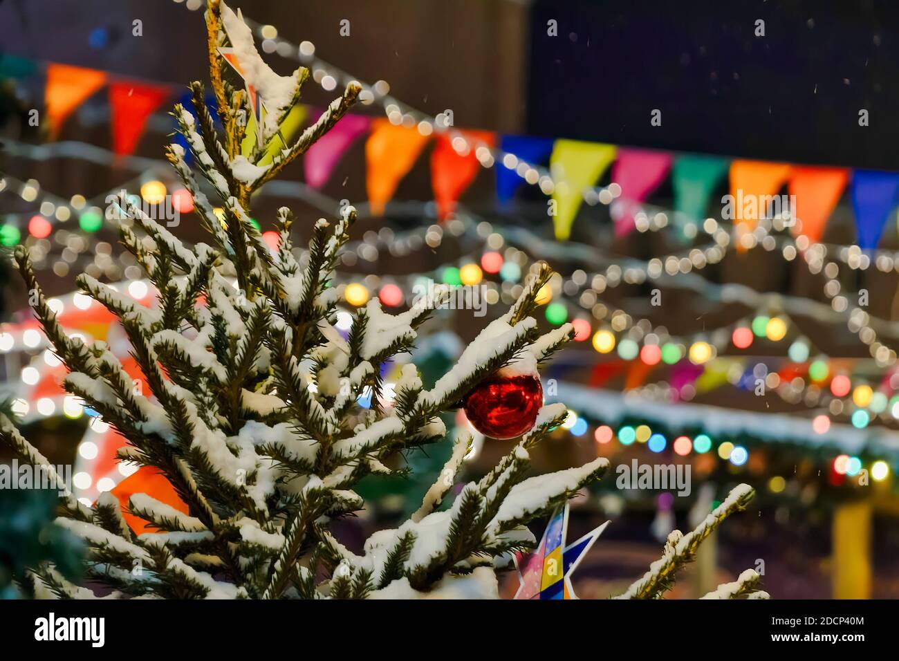 Christmas tree branches under the snow with decorative elements Stock ...