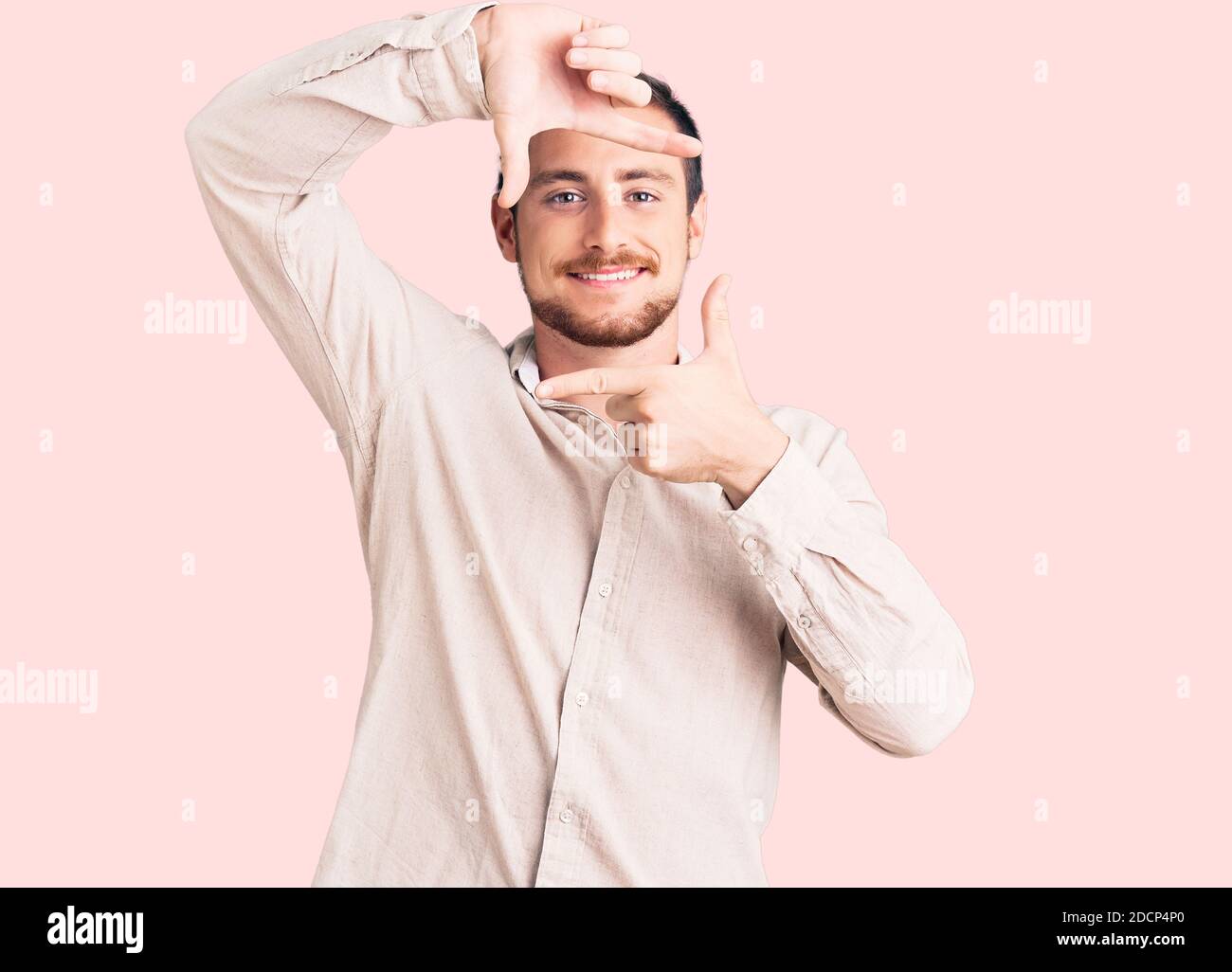 Young handsome caucasian man wearing casual clothes smiling making ...