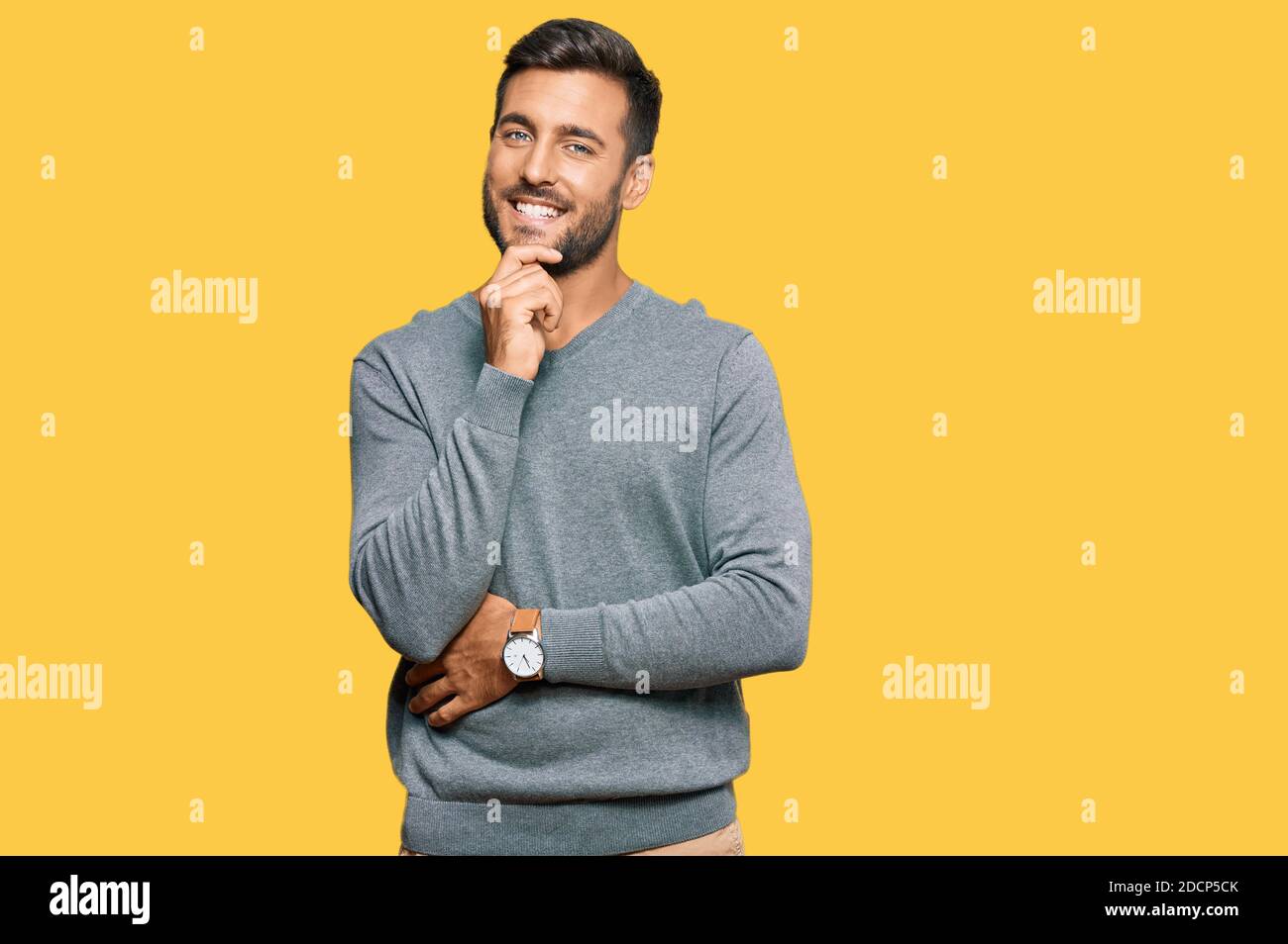 Handsome hispanic man wearing casual clothes looking confident at the ...