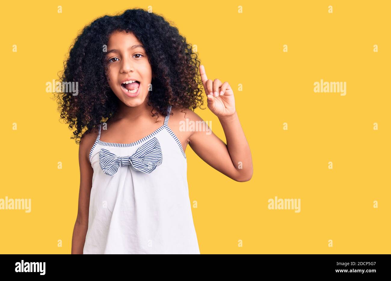 Successful kid curly hair hi-res stock photography and images - Alamy