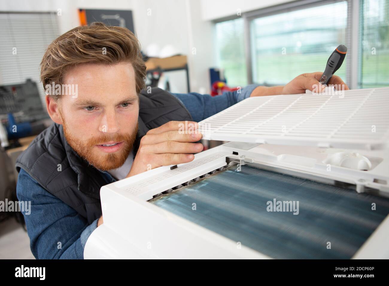 repairing a printer at work Stock Photo - Alamy