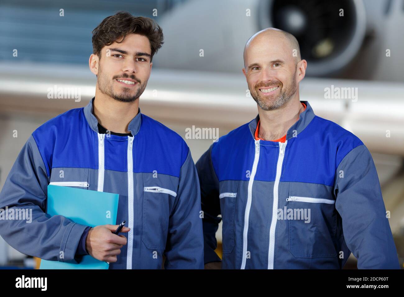 Team mechanics in garage workshop hi-res stock photography and images ...