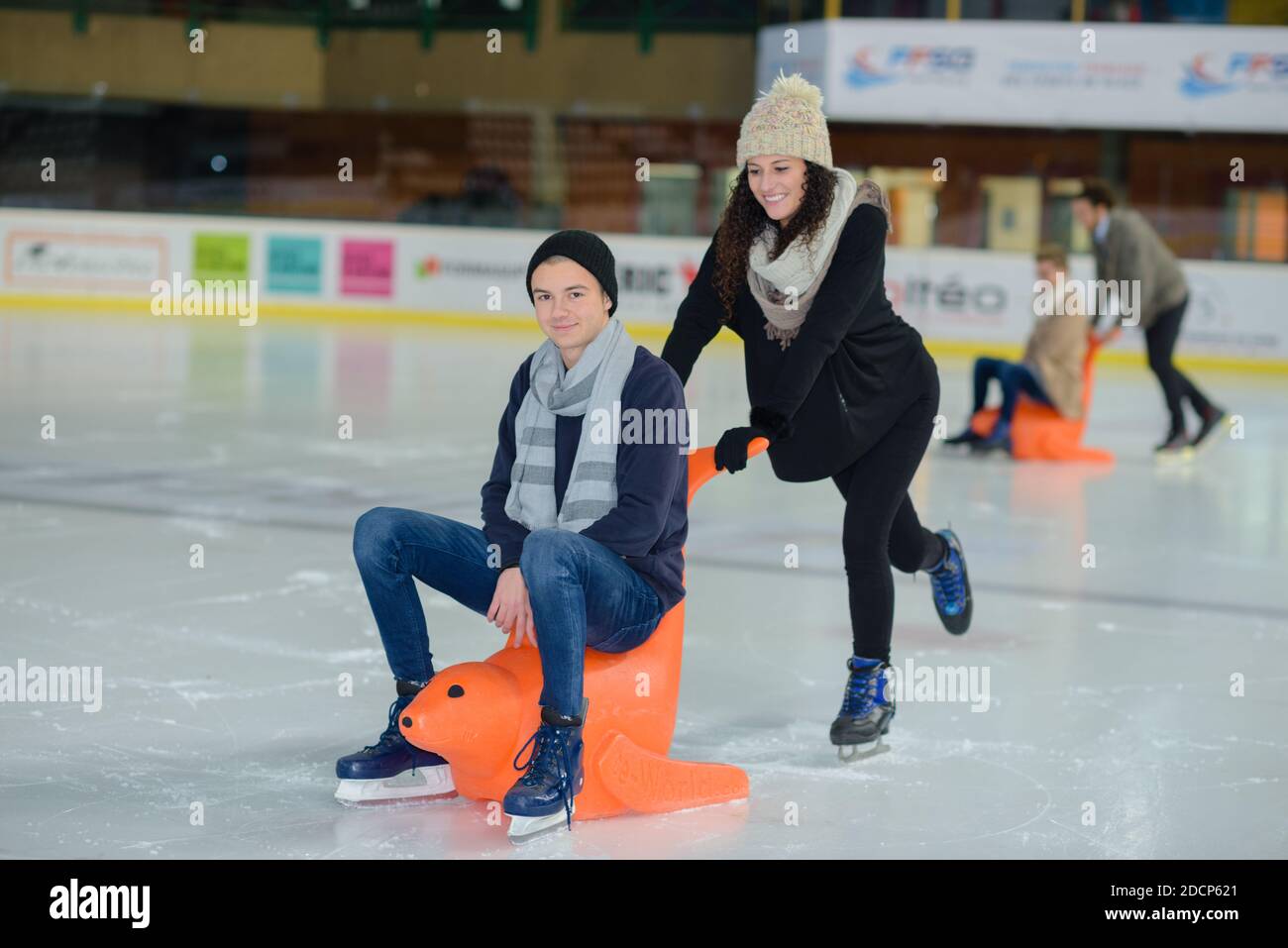 Kid playing on ice hi-res stock photography and images - Alamy