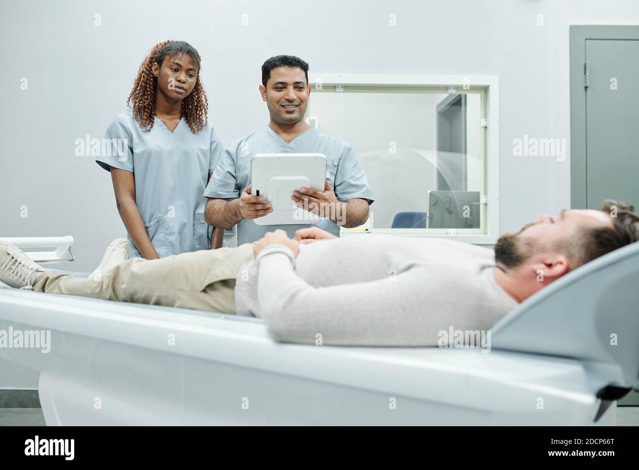 African doctor patient touch hi-res stock photography and images - Alamy