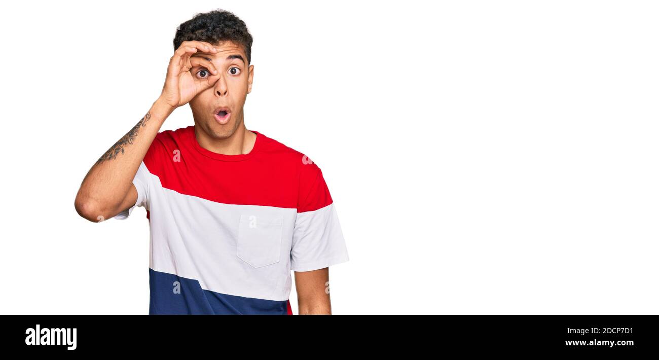 Young handsome african american man wearing casual clothes doing ok ...