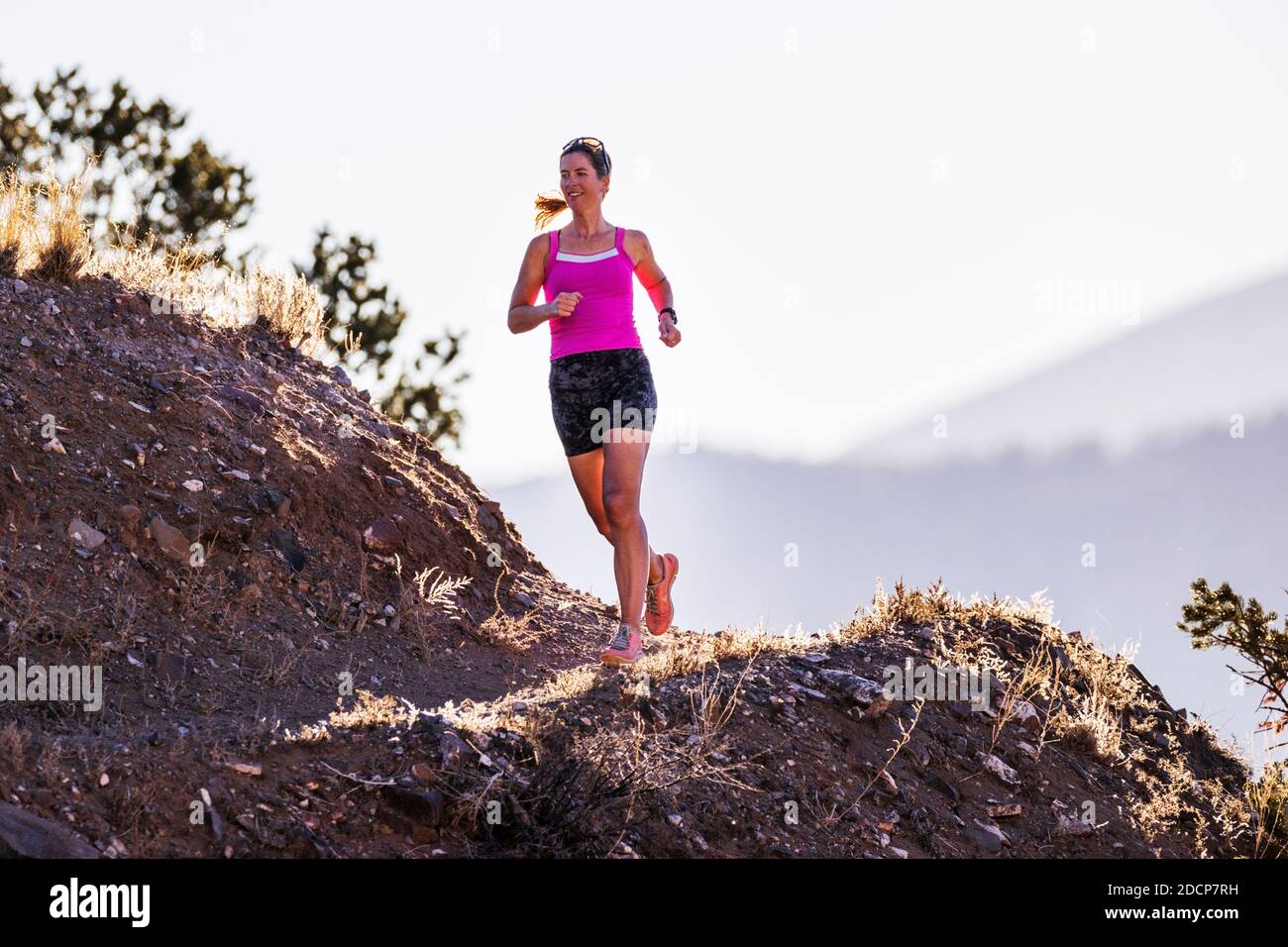 Female athlete running muscles hi-res stock photography and images - Alamy
